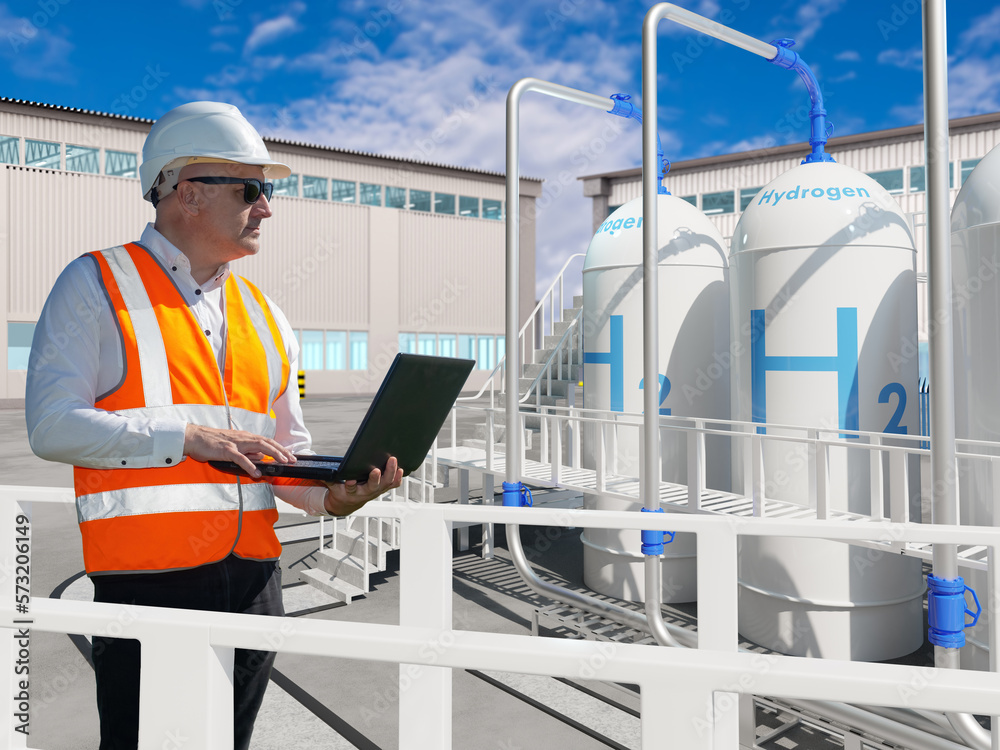 Hydrogen power factory. Man with laptop. Electrolysis of hydrogen. H2 ...