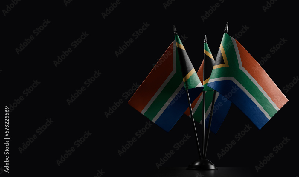 Small national flags of the South Africa on a black background Stock ...