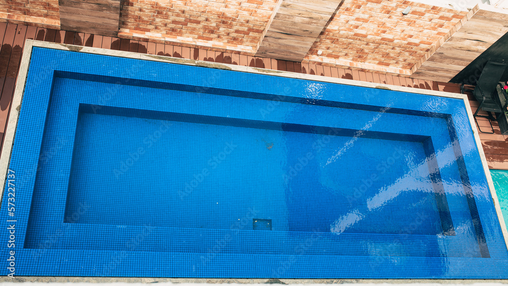 View from the balcony to the swimming pool in the yard - freshness and ...