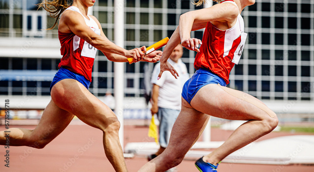 relay race passing of baton women athletes runners Stock Photo | Adobe ...
