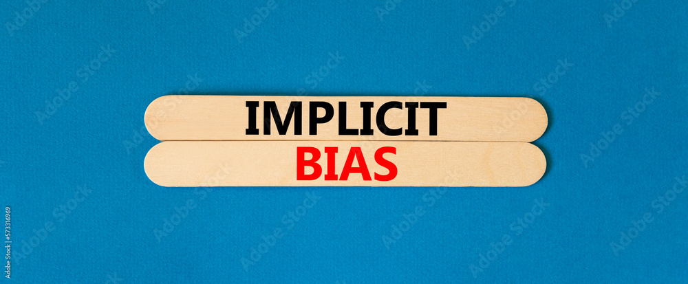 Implicit bias symbol. Concept words Implicit bias on wooden sticks ...