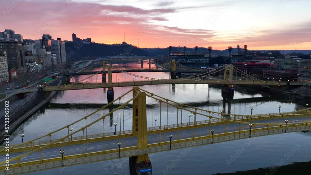 Sunset over three yellow bridges and PNC Park in Pittsburgh ...