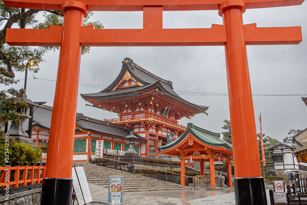 Red traditional Japanese temple building and torii gate architecture at ...