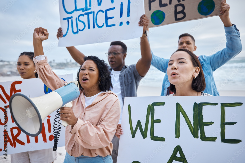 Protest, climate change and megaphone with woman at the beach for ...