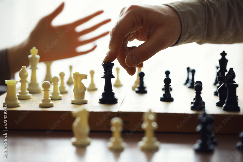 Hand playing game of chess, competition, strategy, battle, play Stock ...