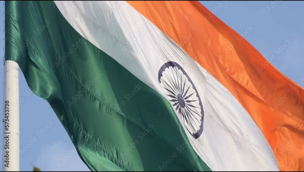 India flag flying high at Connaught Place with pride in blue sky, India ...
