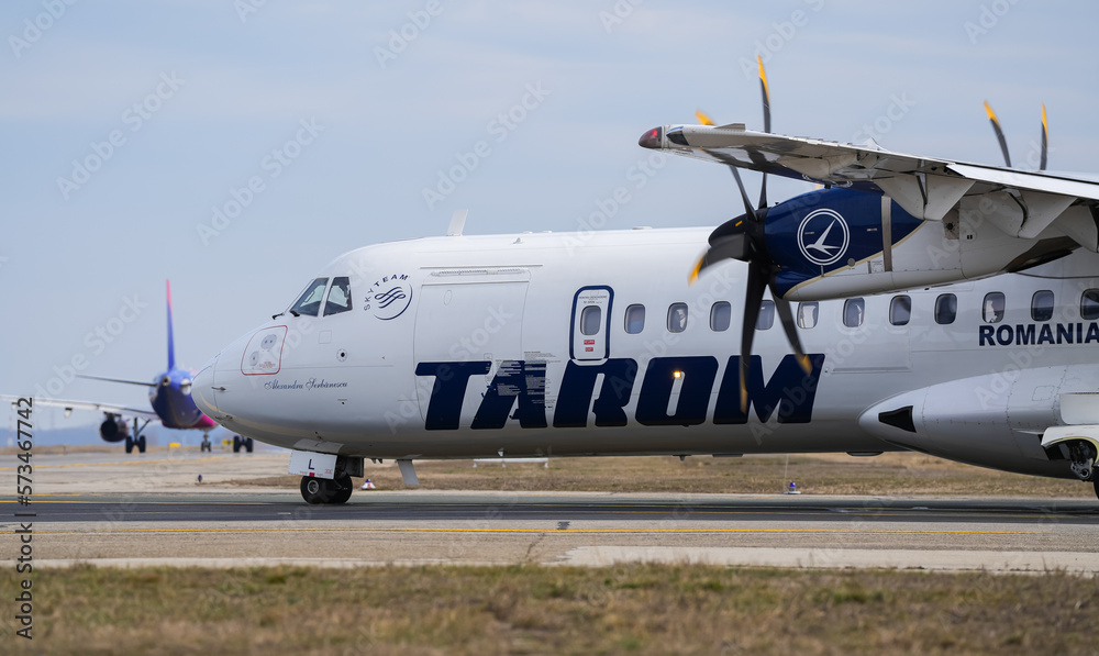 TAROM ATR 72-600 airplane preparing to take of from Otopeni ...