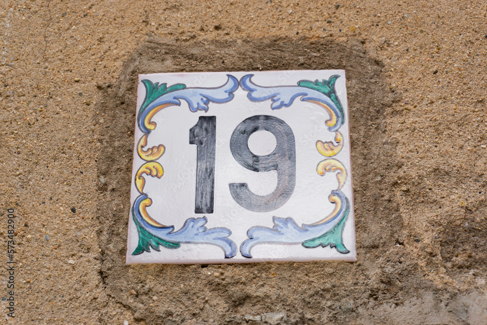 facade of a house with the numbering 19 Stock Photo | Adobe Stock