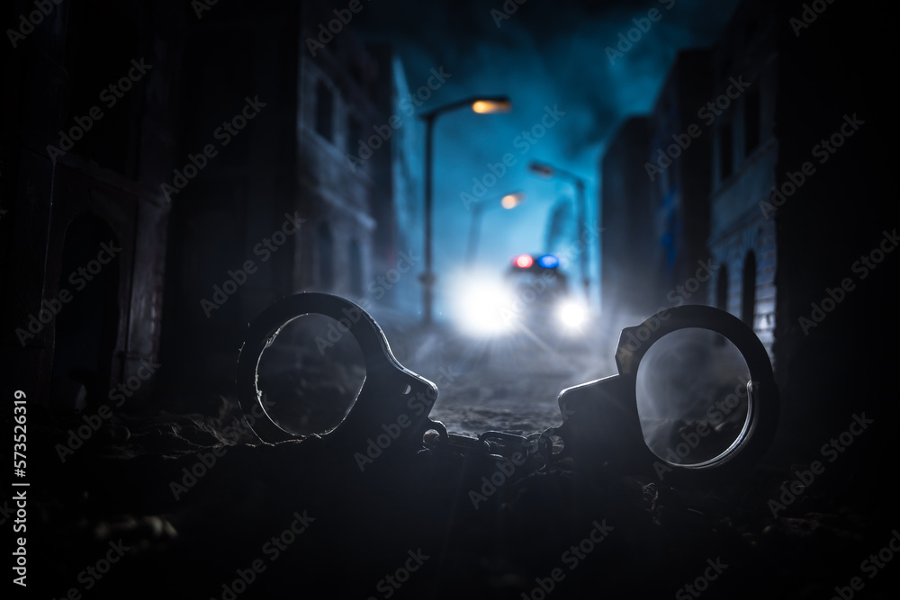 Police raid at night and you are under arrest concept. Silhouette of ...