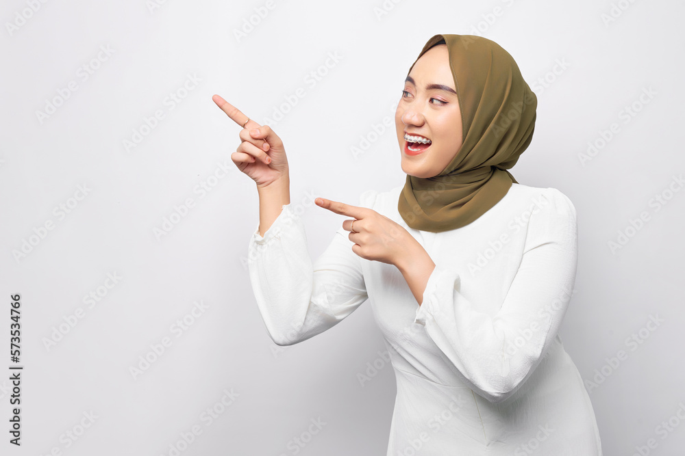 Beautiful cheerful young Arabian Asian Muslim woman wearing hijab ...