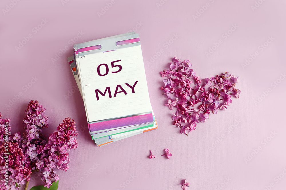 Calendar for May 5: desk calendar with numbers 05, the name of the ...