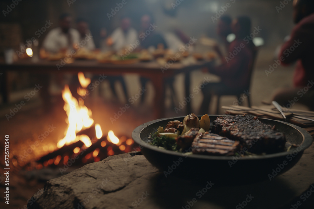 A traditional South African braai (barbecue), with meat sizzling over ...