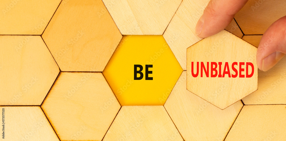 Be unbiased symbol. Concept words Be unbiased on wooden puzzles ...