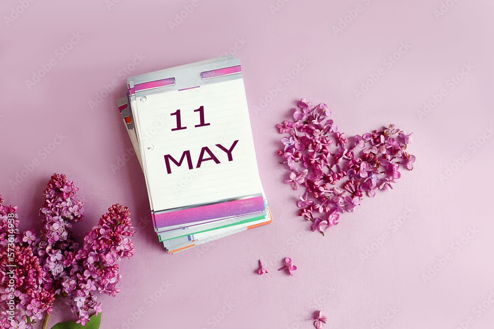 Calendar for May 11: a desk calendar with the numbers 11, the name of ...