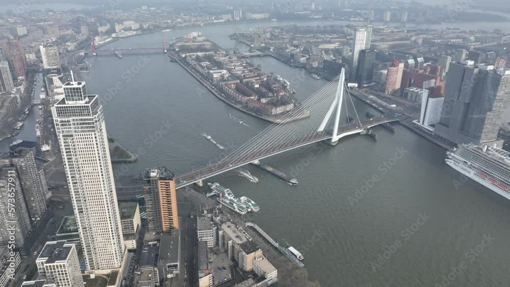 Experience Rotterdam's impressive skyline as the drone glides over the ...