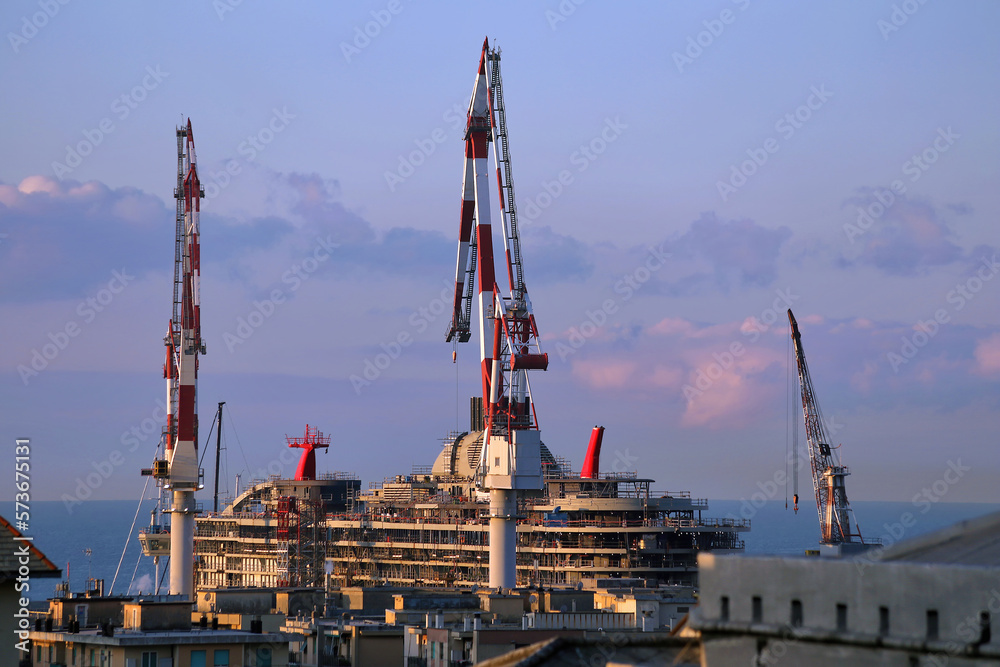 Cranes and cruise ship in the Genoa shipyards site of Sestri Ponente ...