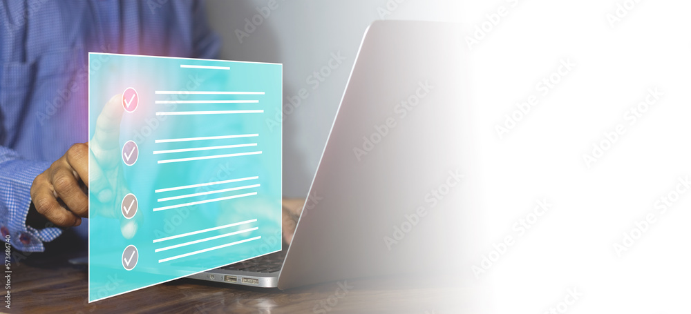 Business performance checklist concept, businessman using laptop doing ...
