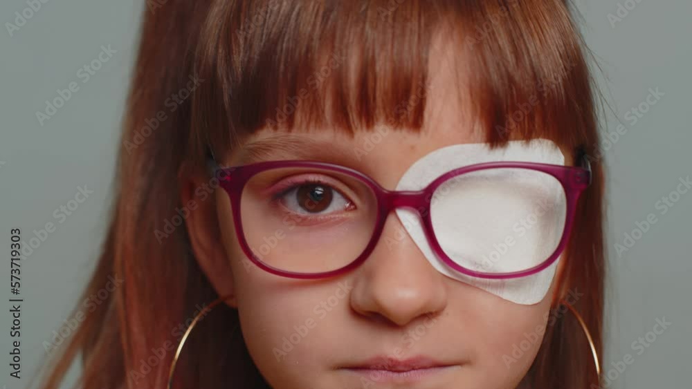 Close-up portrait sick ill preteen girl having protective bandage ...