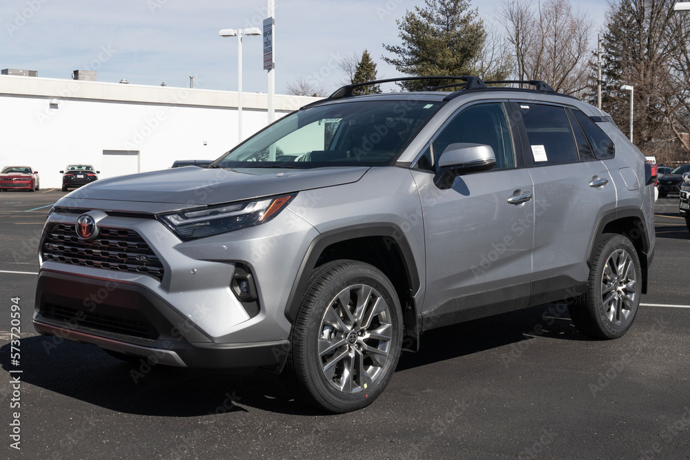 Toyota RAV4 Hybrid display at a dealership. Toyota offers the RAV4 in ...