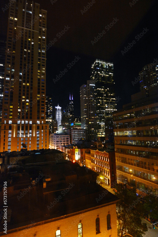 The Chicago skyline at night with a rich dark sky and lighted tall ...