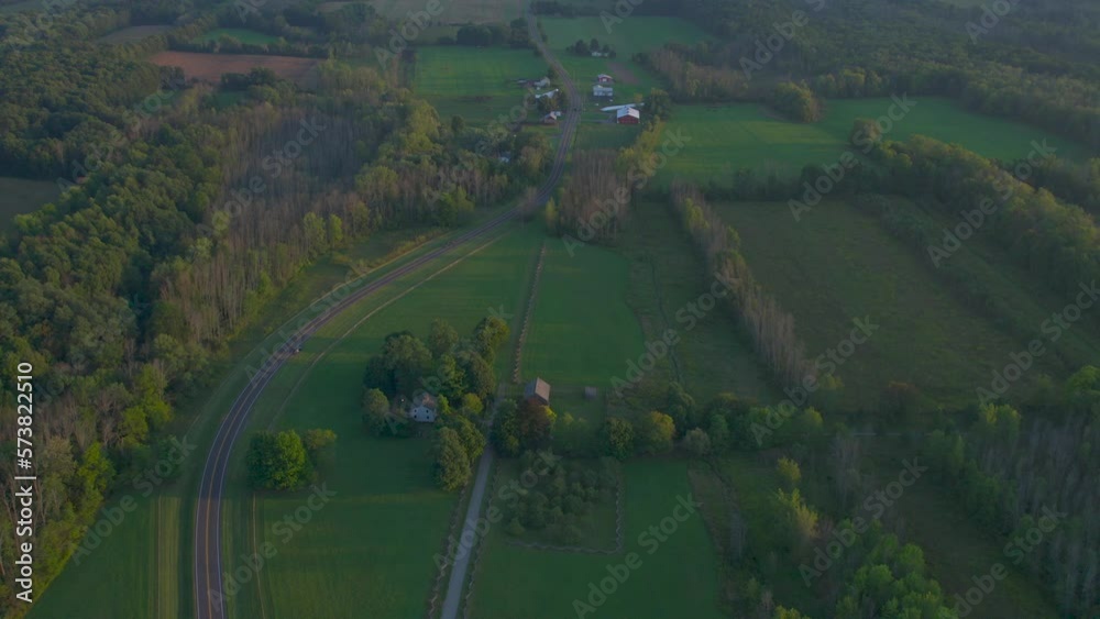 super high drone shot of the Joseph Smith family farm, frame house ...