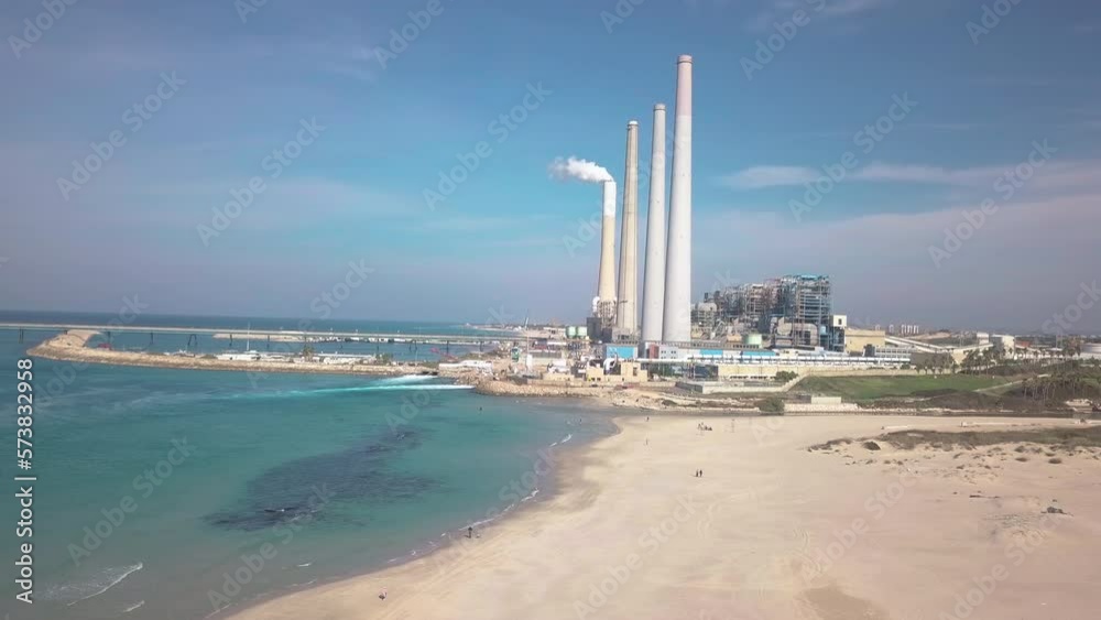 Wide Aerial dolly shot of the Hadera Desalination Plant, Israel, over ...