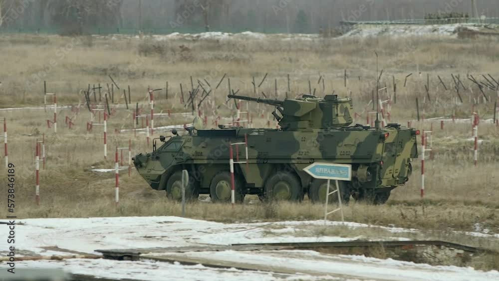 Military exercises. Armored personnel carrier at the training ground ...