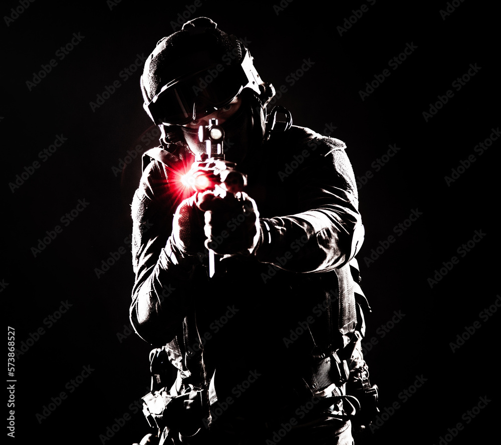 A contour silhouette of a soldier fighting in the darkness. Respect for ...