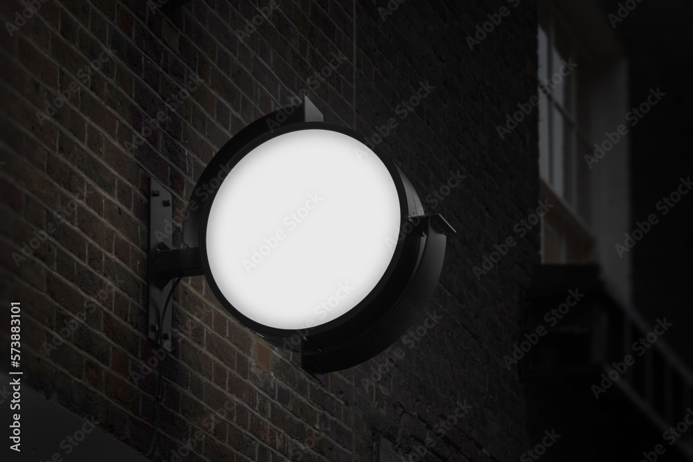 Blank circle shape lightbox sign mockup in the urban environment, empty ...
