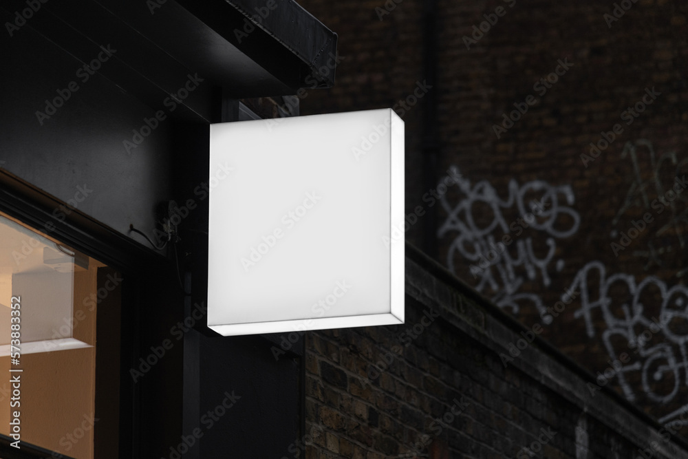Blank square lightbox sign mockup in the urban environment, empty space ...