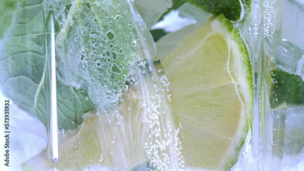 Cold lemonade mojito cocktail carbonated drink. Closeup refreshing soda tonic fizzy sparkling ...