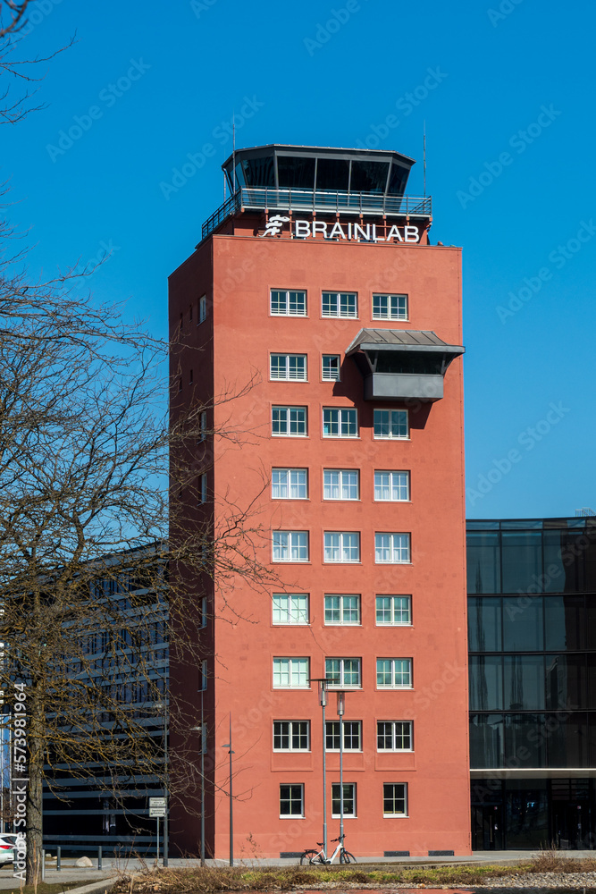 BRAINLAB headquarters with logo in sunshine (former airport tower ...