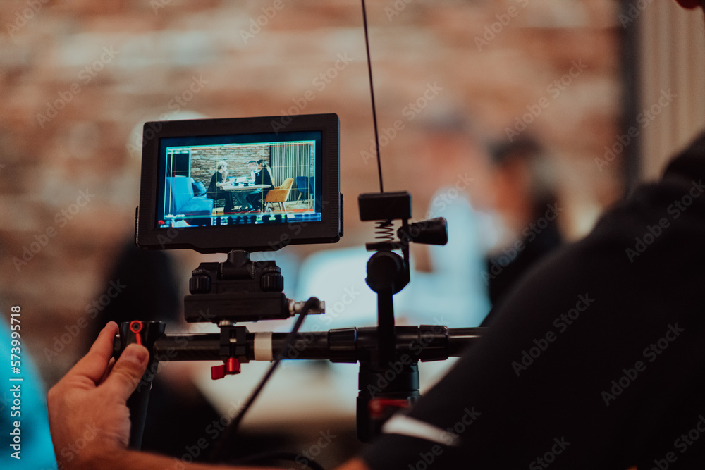 Behinde The Scenes. A cameraman records a business meeting that is ...
