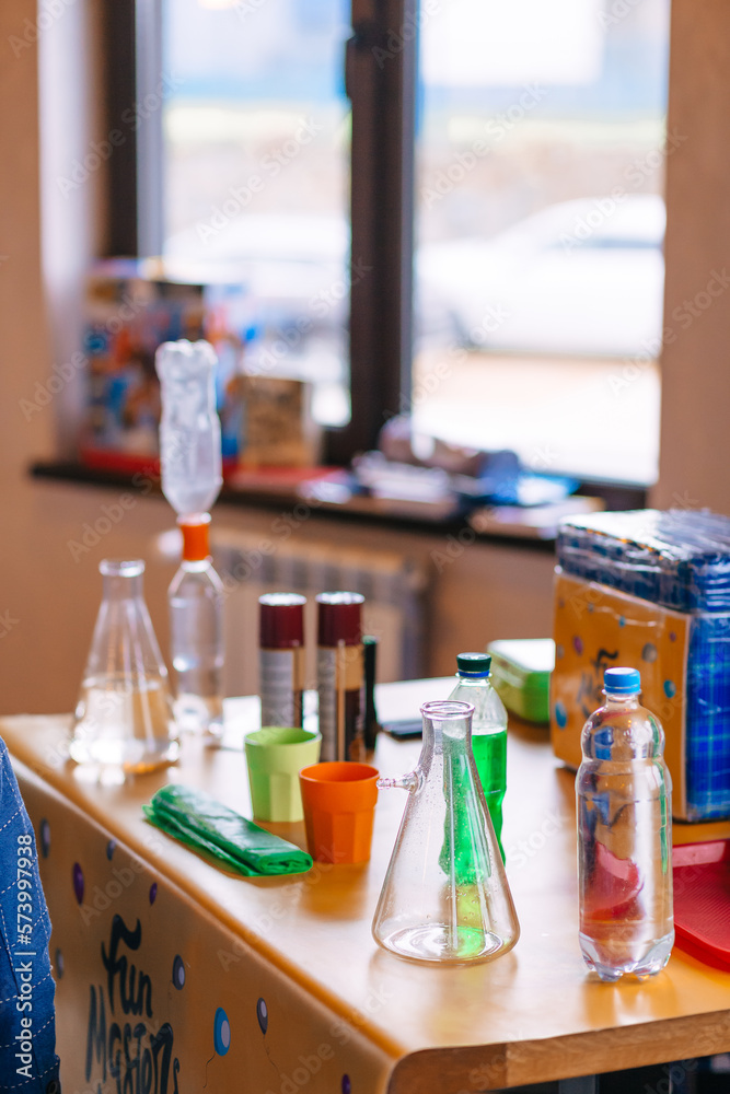 on the table there are various devices for conducting experiments ...