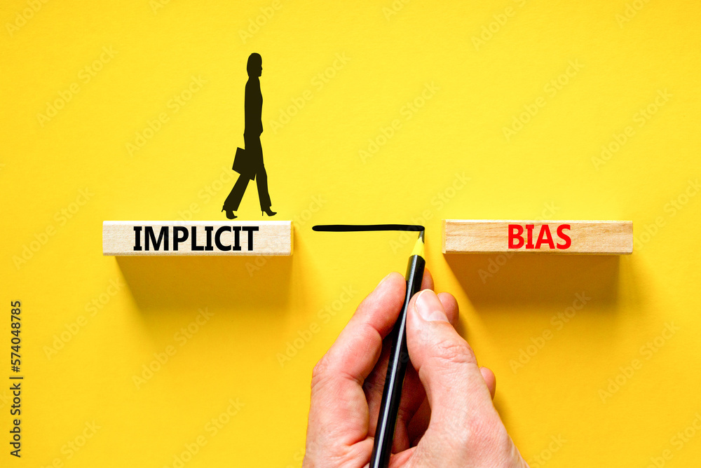 Implicit bias symbol. Concept words Implicit bias on wooden block ...