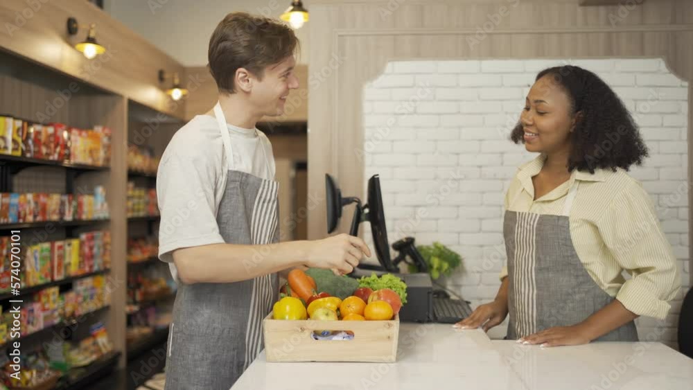 Portrait of a black african american woman working on cashier in a ...