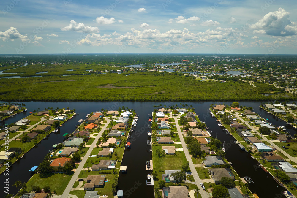 Aerial view of rural private houses in remote suburbs located near ...