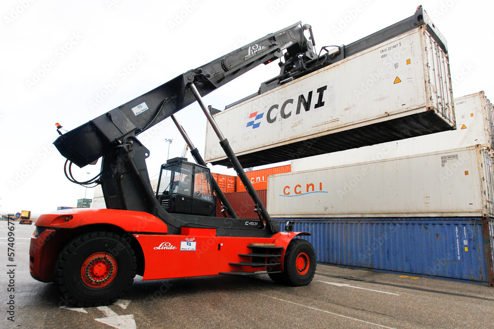 Marín-Spain Container truck picking up a container to be loaded onto a ...