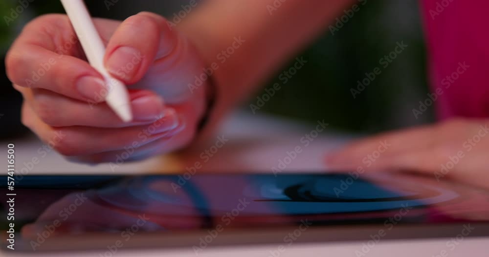 Woman is engaged her favorite hobby drawing modern mandalas tablet ...