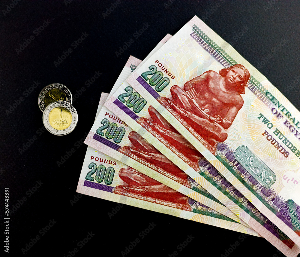egyptian money two hundred pounds and one pound ,banknote and coin ...