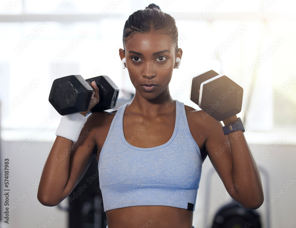 Woman, fitness and weightlifting dumbbells at gym for intense exercise ...