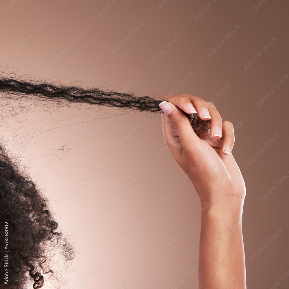 Hair in hands, afro beauty and black woman on brown background for ...