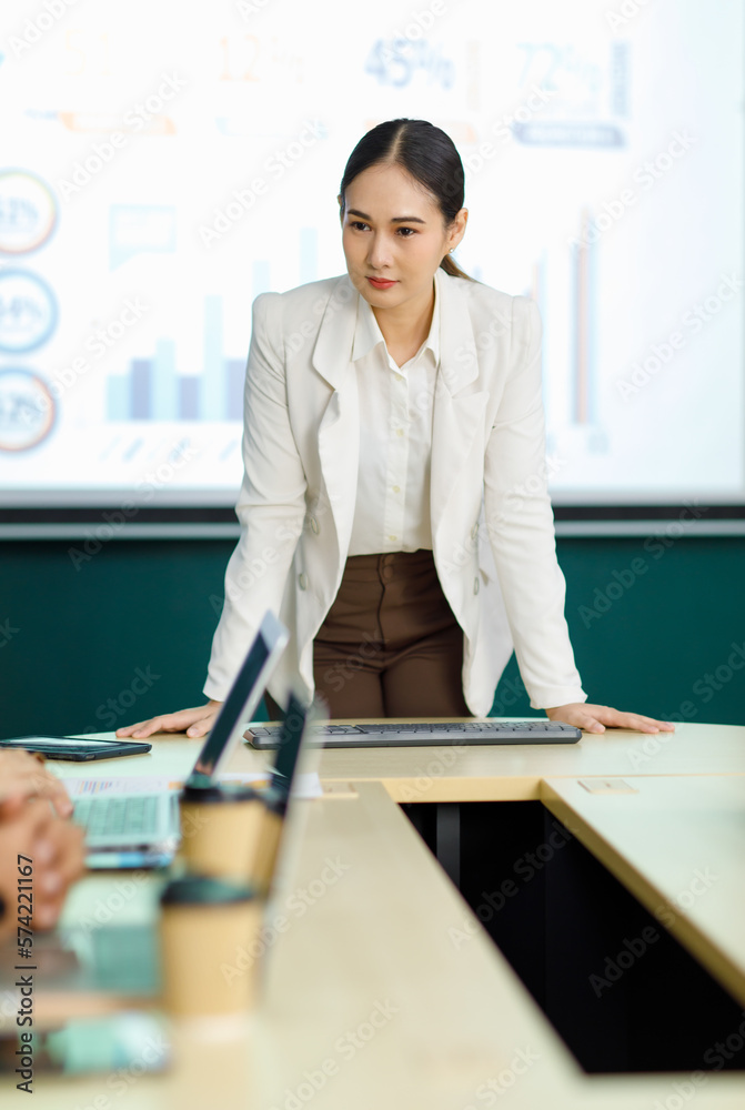 Millennial Asian professional successful female businesswoman presenter ...