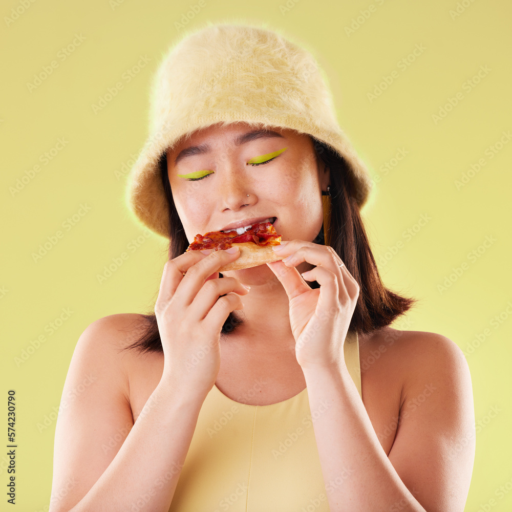 Asian girl, eating pizza and studio with fashion, happiness and retro ...