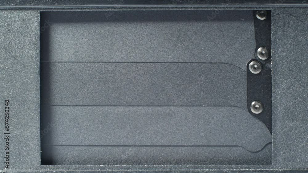 Actuation of the shutter mechanism of an old film camera inside the ...