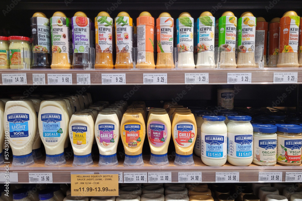 PENANG, MALAYSIA - 22 FEB 2023: Various brands of salad dressing, chili ...