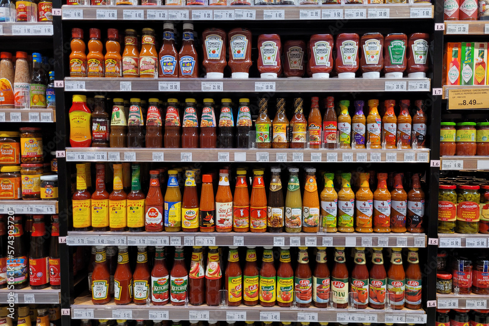 PENANG, MALAYSIA - 22 FEB 2023: Various brands of salad dressing, chili ...