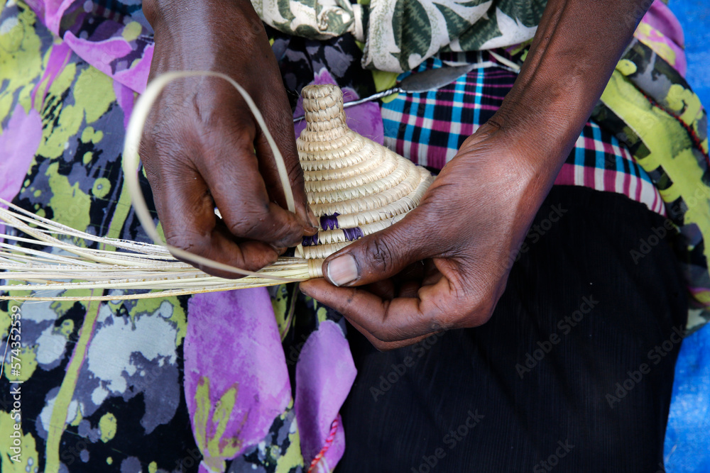 ENCOT microfinance client making a rattan basket. Uganda. Stock Photo ...