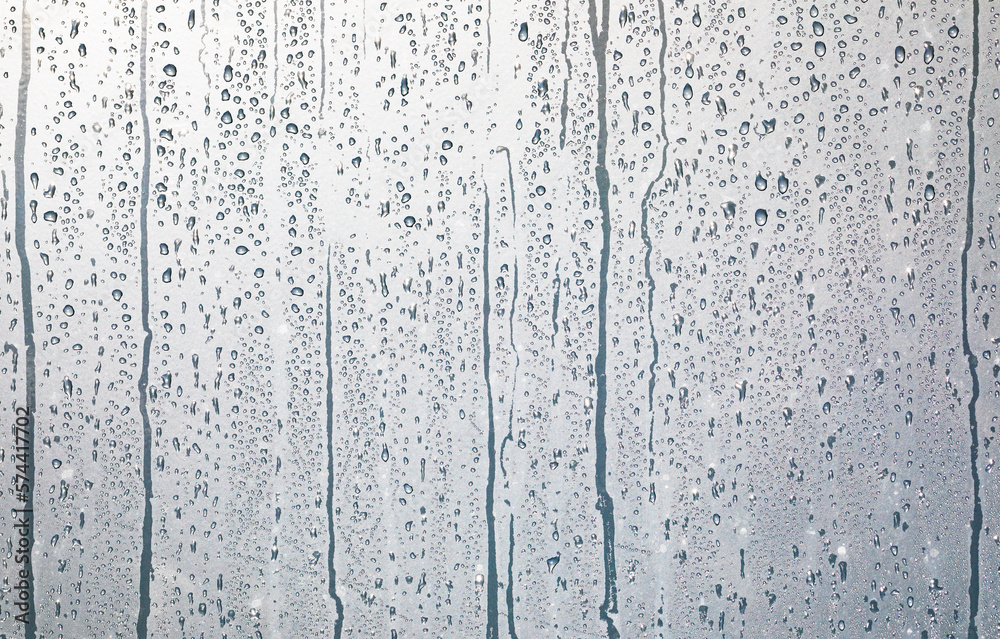 water drops on a window or in the shower cabin,wet transparent panorama ...