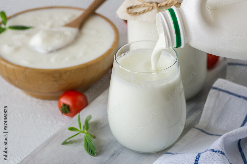 Glass cup of Turkish traditional drink ayran , kefir or buttermilk made ...
